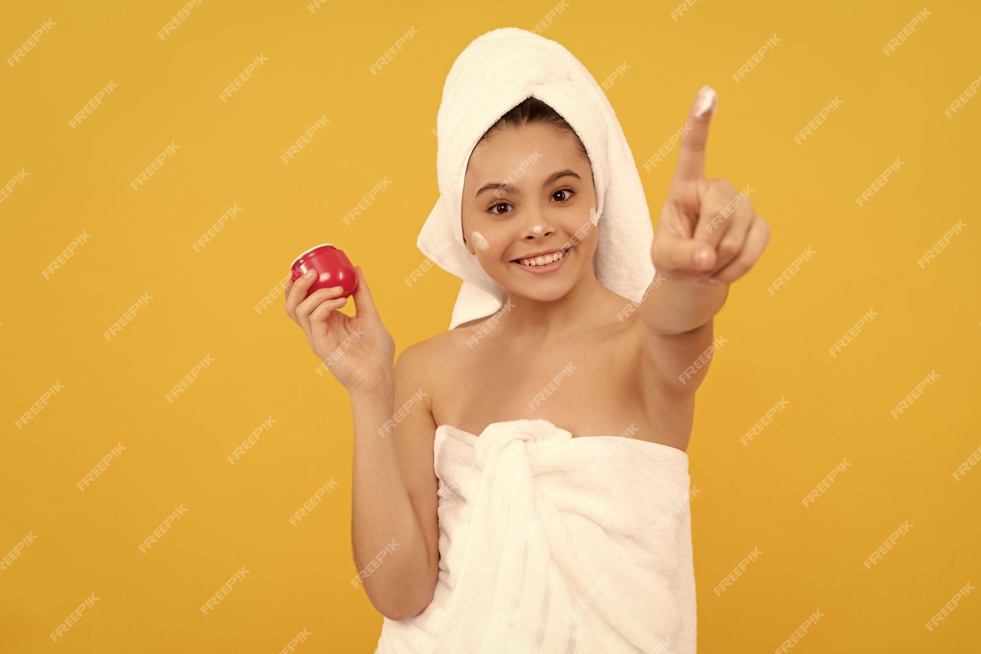 Premium Photo Happy Teen Girl In Shower Towel Apply Facial Cream