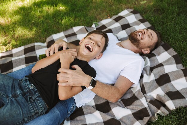 Premium Photo Happy Young Father Have Fun With His Little Son
