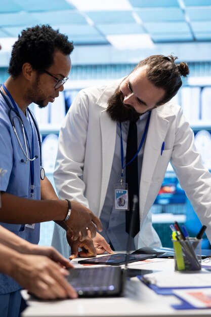 Premium Photo | Healthcare professionals examine human anatomy scans to ... Premium Photo | Healthcare professionals examine human anatomy scans to ...