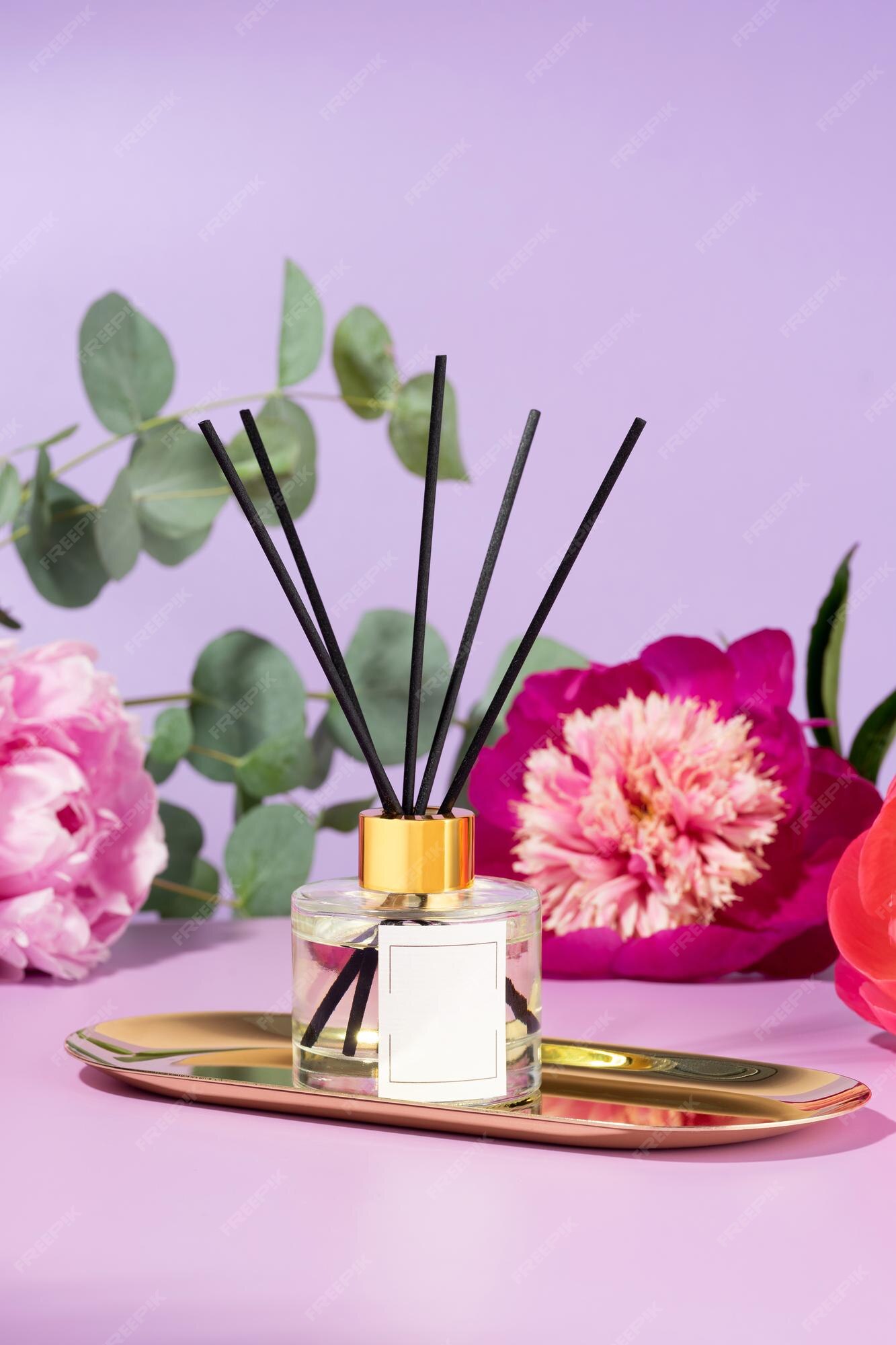 Premium Photo Home Comfort Decoration And Aromatherapy Concept Scented Diffuser On The Golden