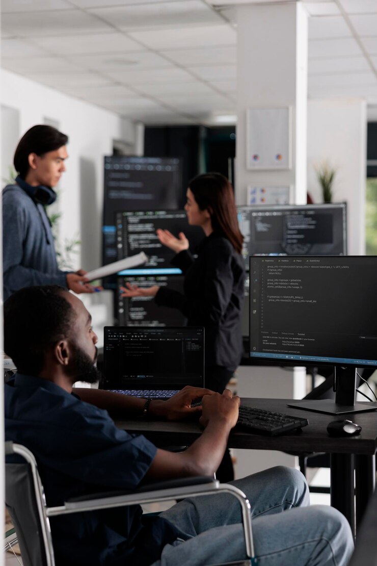 Premium Photo It Programmer In Wheelchair Typing Html Code In Coding