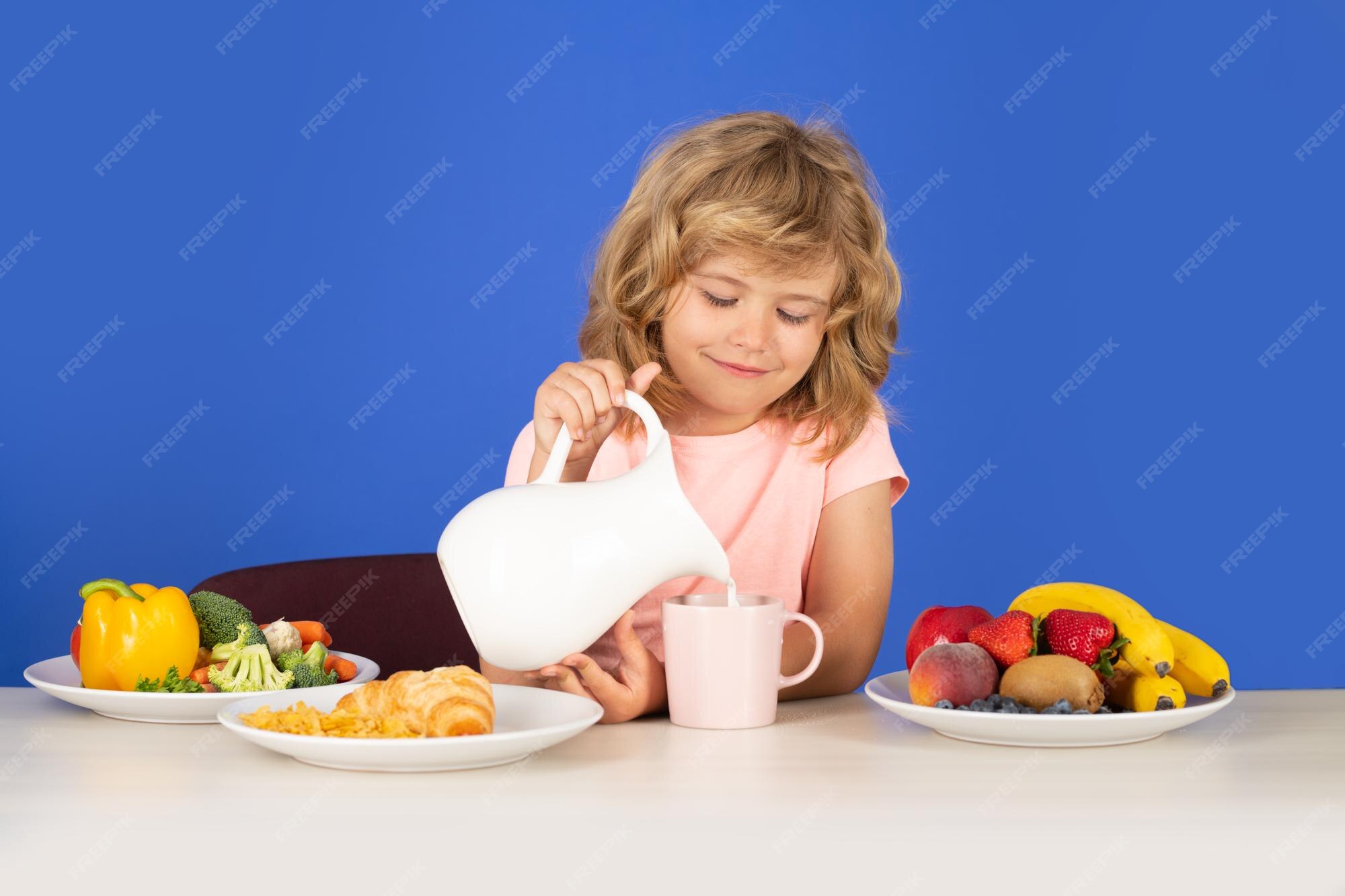 Premium Photo | Kid boy pouring whole cows milk portrait of child eat ... Premium Photo | Kid boy pouring whole cows milk portrait of child eat ...