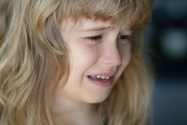 Premium Photo | Kid crying with a tear on cheek child with sad ... Premium Photo | Kid crying with a tear on cheek child with sad ...