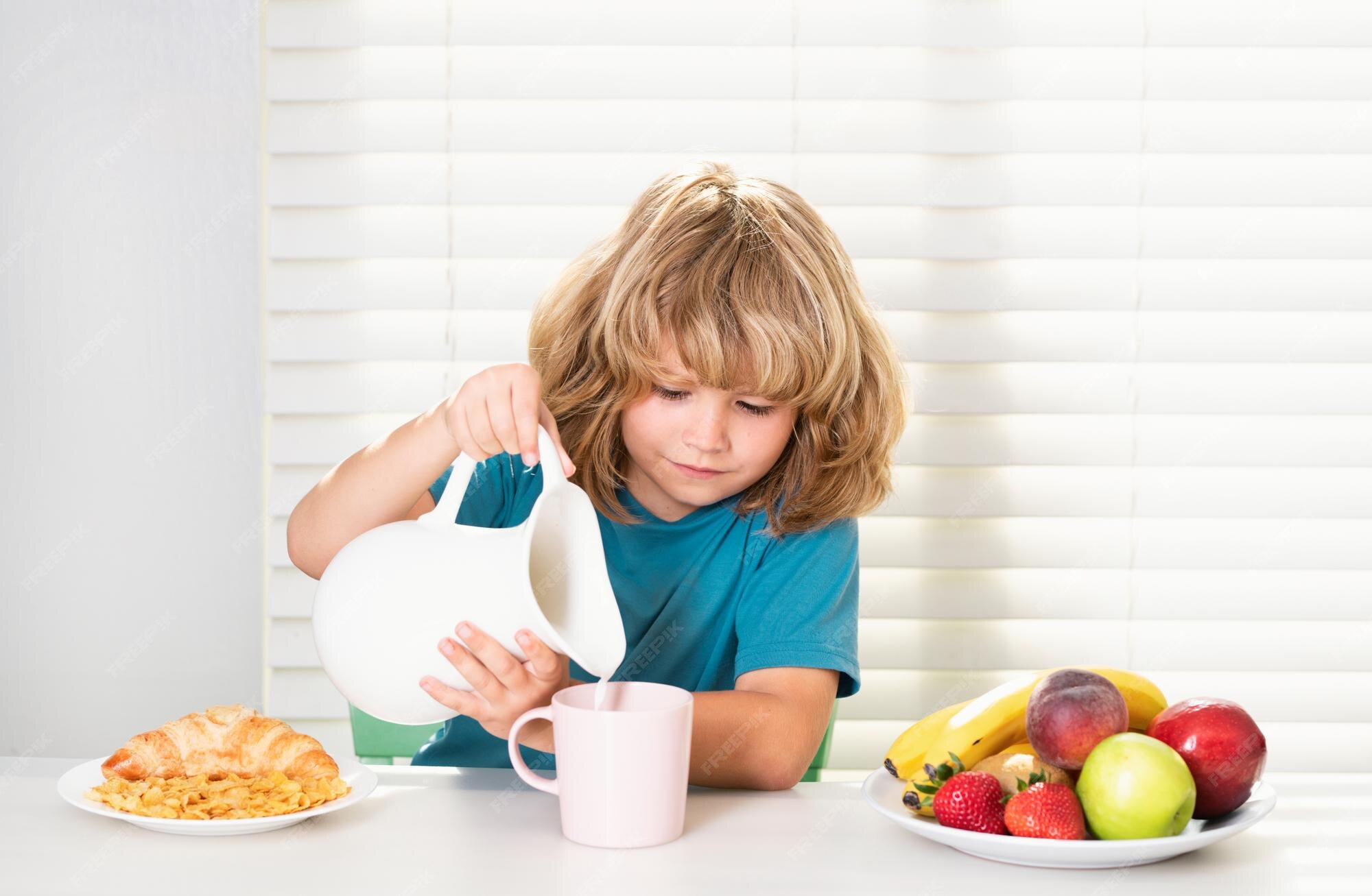Premium Photo | Kid pouring whole cows milk child boy eating organic ... Premium Photo | Kid pouring whole cows milk child boy eating organic ...