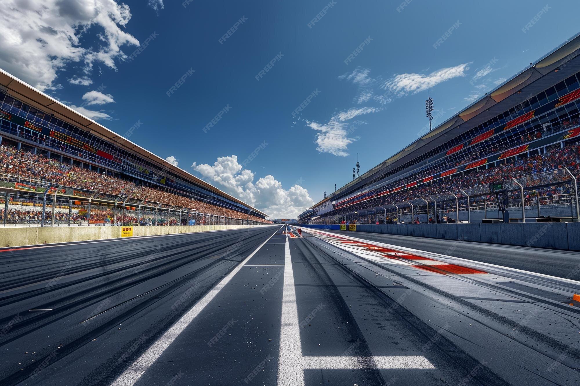 Premium Photo | A long and empty racetrack with a blue sky and white clouds Premium Photo | A long and empty racetrack with a blue sky and white clouds