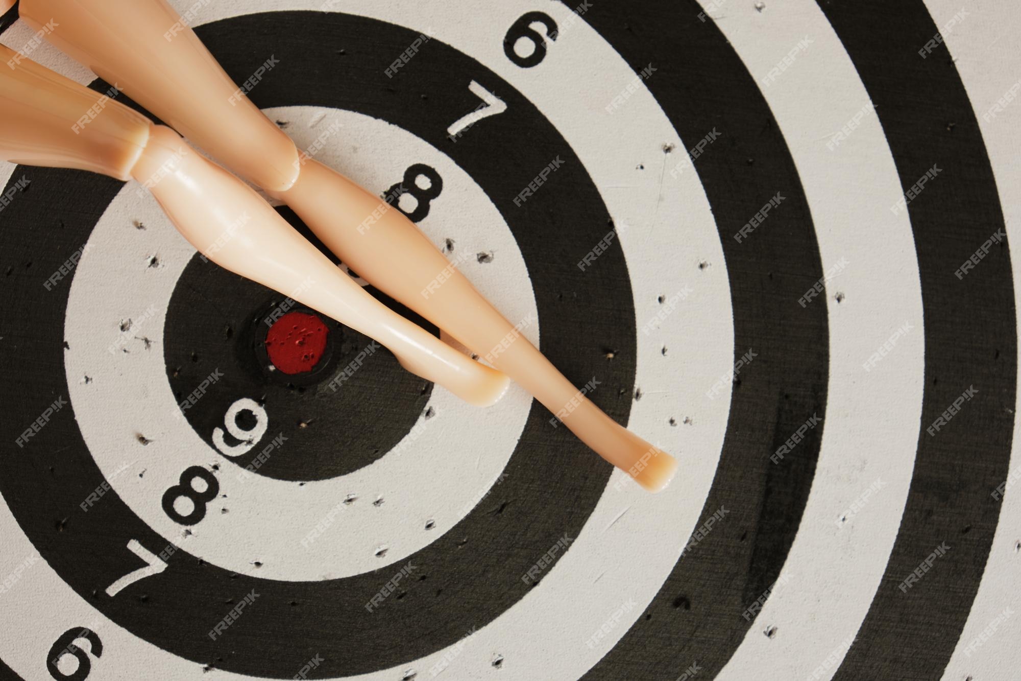 Premium Photo Long Legs Of The Legendary Doll On The Darts Board