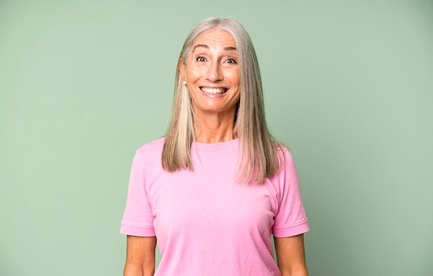 Premium Photo Looking Happy And Goofy With A Broad Fun Loony Smile And Eyes Wide Open