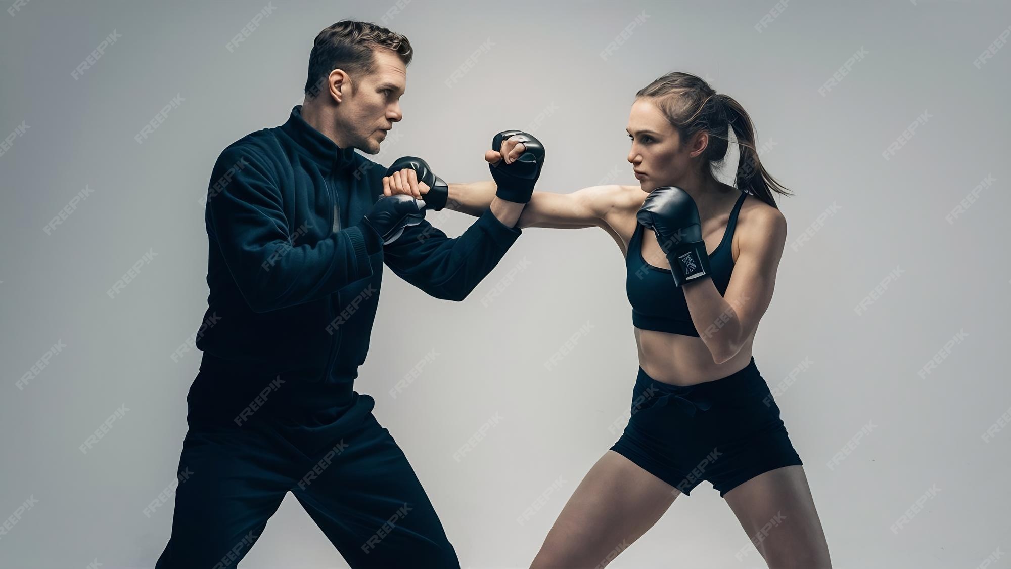 Premium Photo Man In Black Outfit And Athletic Caucasian Woman
