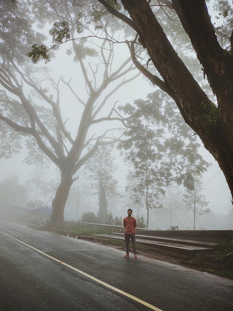 Premium Photo | Man standing on road Premium Photo | Man standing on road