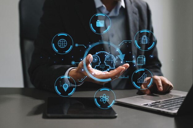 Premium Photo | Man using chatbot in computer and tablet smart intelligence aichat with ai ...