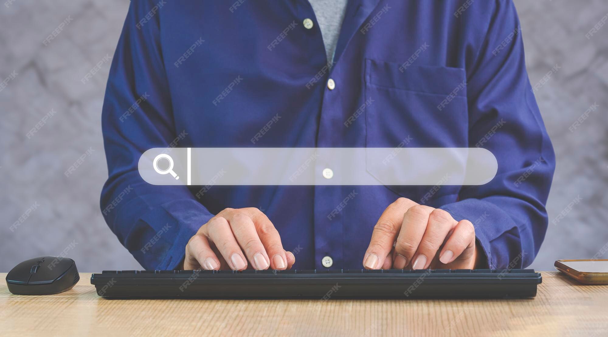 Premium Photo | Man using computer keyboard to searching information on web browser with virtual ...