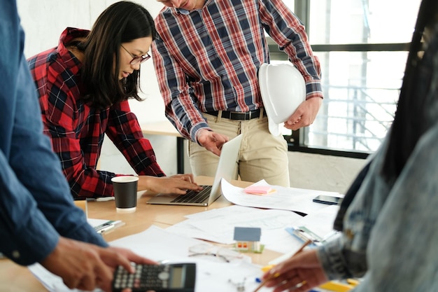 Premium Photo | Midsection of architect discussing with woman over ... Premium Photo | Midsection of architect discussing with woman over ...