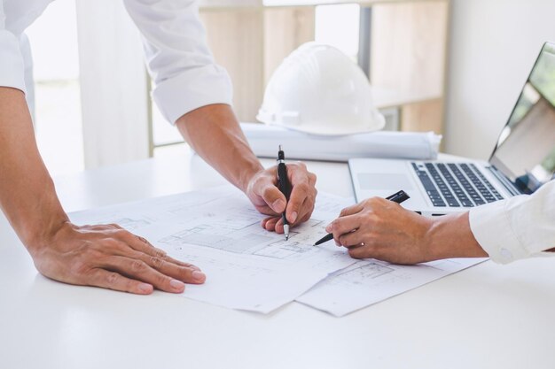 Premium Photo | Midsection of architect preparing blueprints on table Premium Photo | Midsection of architect preparing blueprints on table