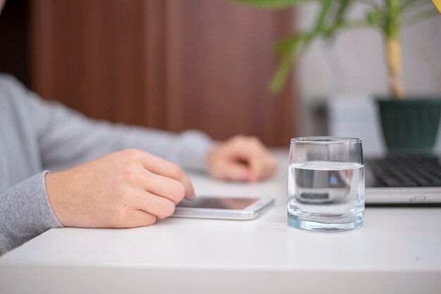 Premium Photo Midsection Of Man Drinking Glass On Table