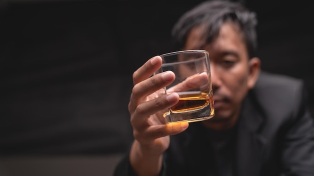 Premium Photo Midsection Of Man Drinking Glass