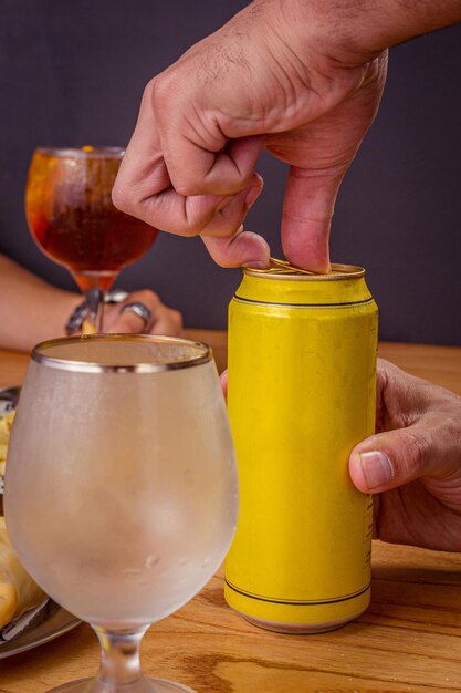Premium Photo Midsection Of Man Holding Wine Glass On Table