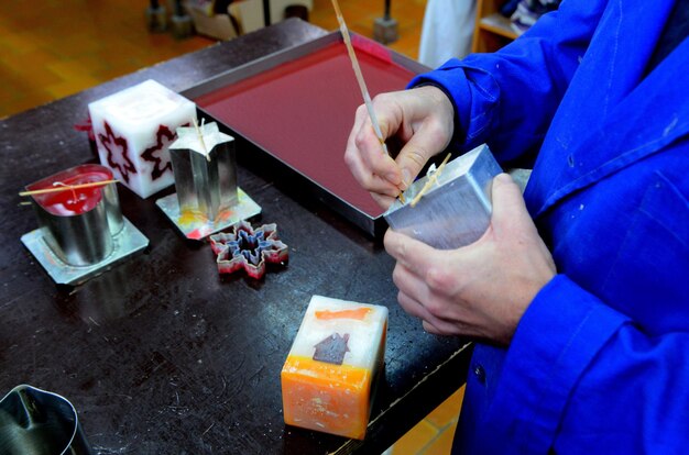 Premium Photo | Midsection of person holding container Premium Photo | Midsection of person holding container