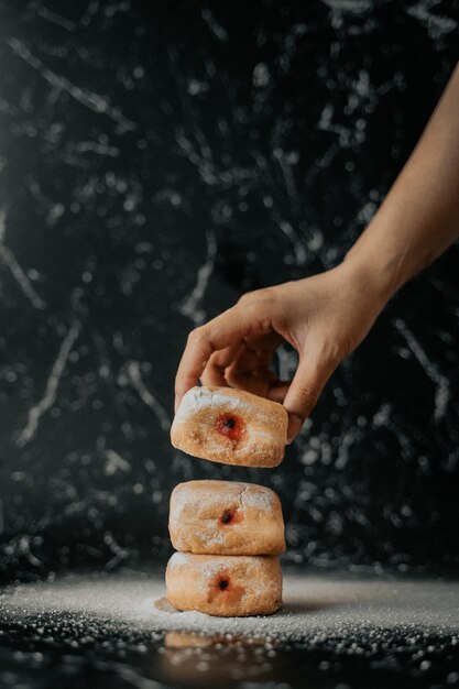 Premium Photo Midsection Of Person Taking Food Donut