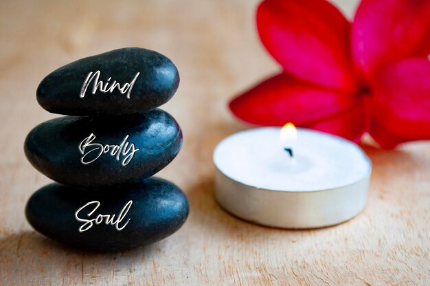 Premium Photo Mind Body And Soul Text Engraved On Black Zen Stones