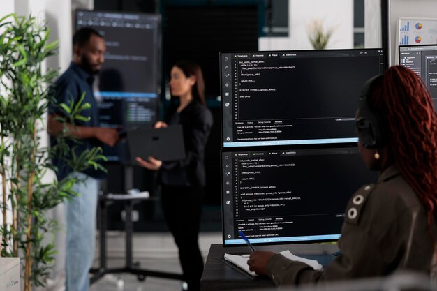 Premium Photo Multi Ethnic Team Of Software Developers Analyzing Code