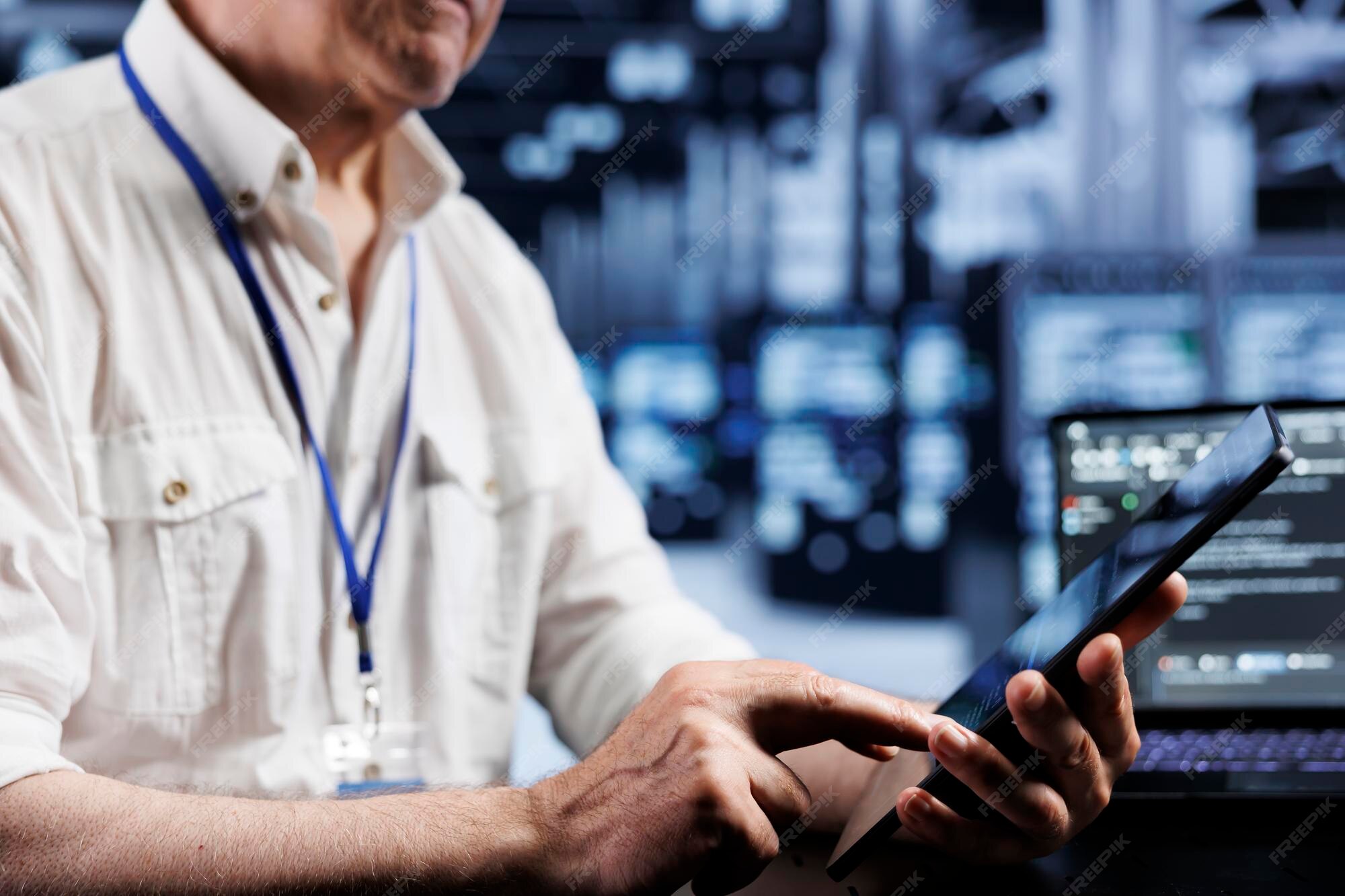 Premium Photo | Octogenarian it programmer coding in high tech data center using javascript ...