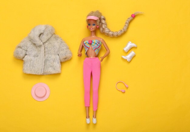 Premium Photo Odessa Ukraine June 1 2021 Barbie Doll With Accessories On Yellow Background