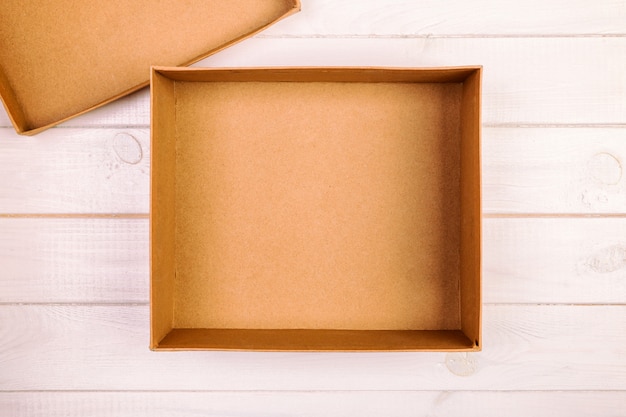 Premium Photo | Opened empty cardboard box Premium Photo | Opened empty cardboard box
