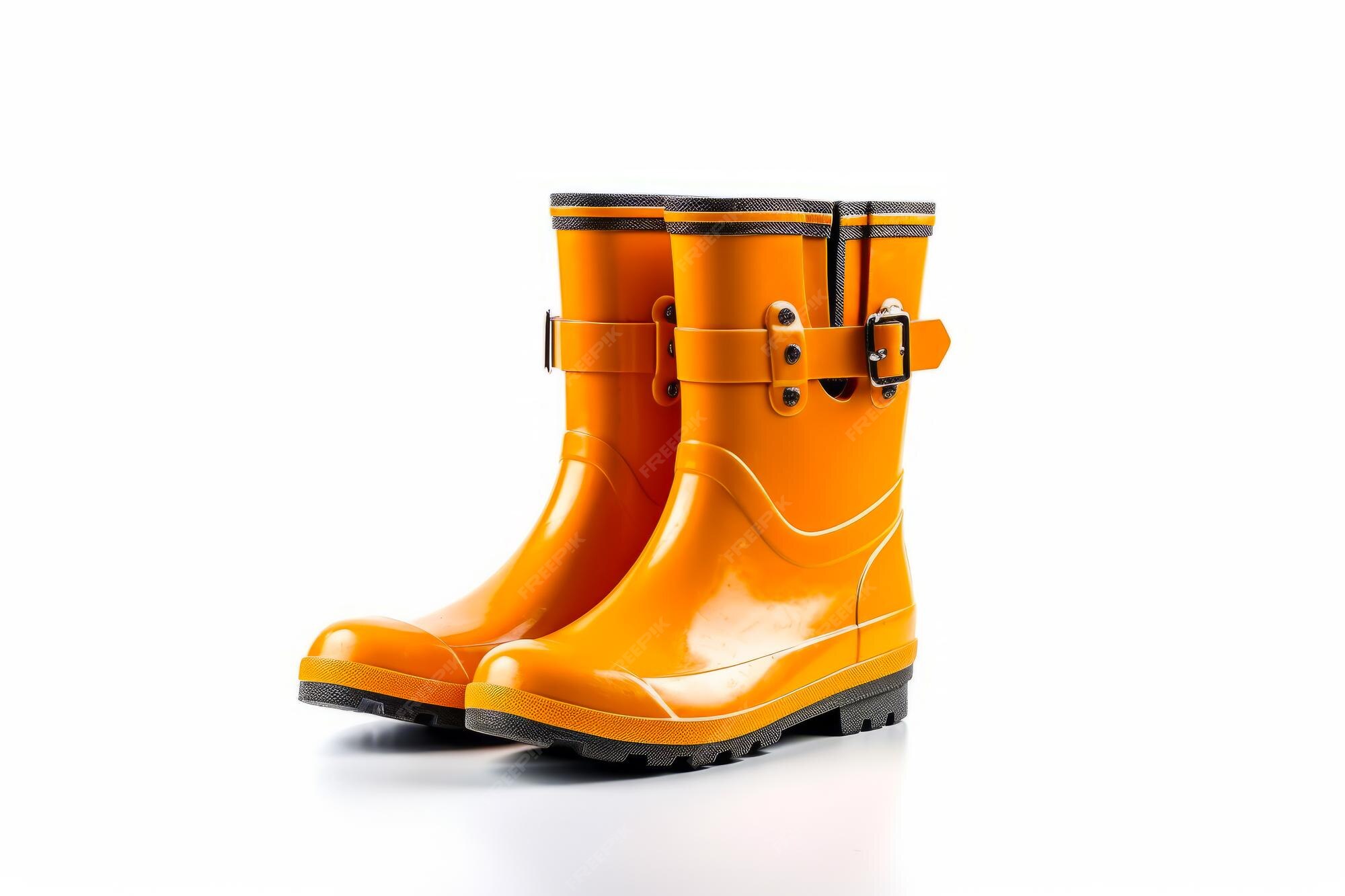 Premium Photo Pair Of Yellow Rain Boots Sitting On Top Of White Floor Next To Each Other