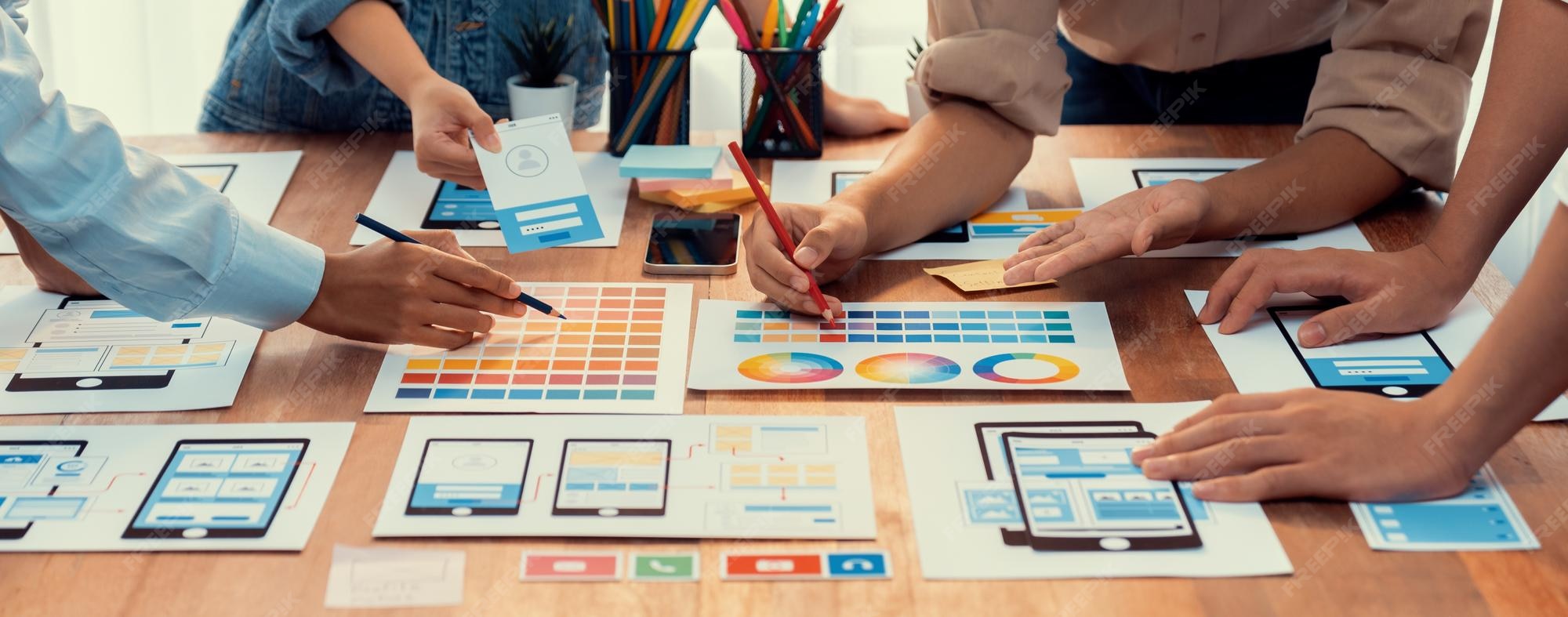 Premium Photo Panorama Shot Of Frontend Developer Team Brainstorming Ui And Ux Designs For