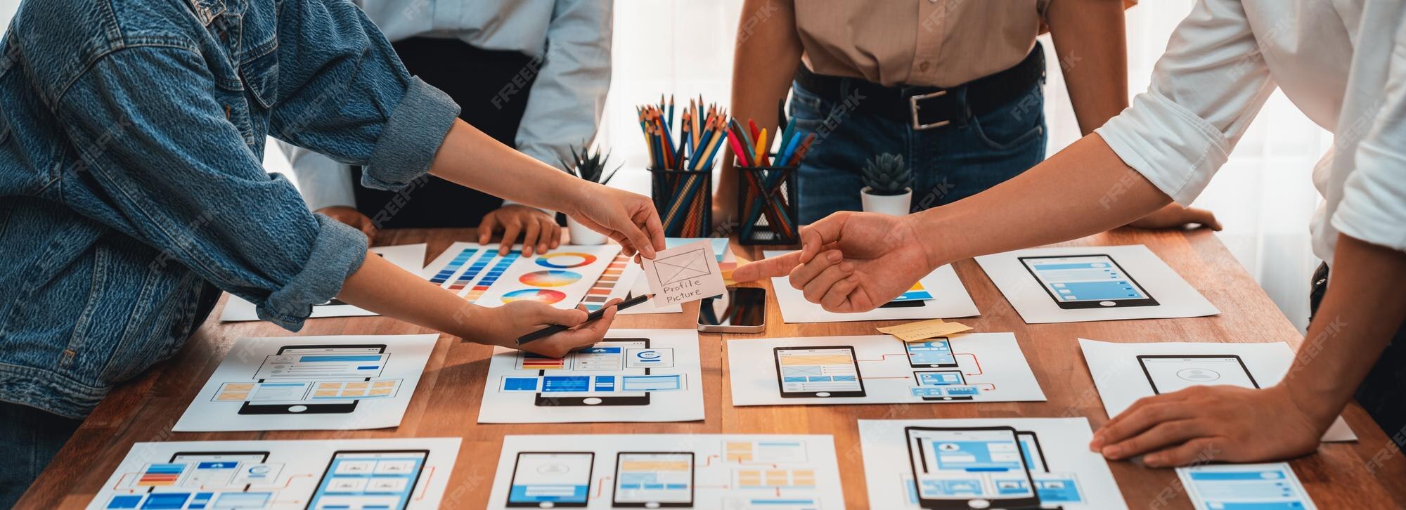 Premium Photo Panorama Shot Of Frontend Developer Team Brainstorming Ui And Ux Designs For