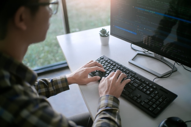 Premium Photo | Pensive programmer working on desktop pc programming ... Premium Photo | Pensive programmer working on desktop pc programming ...