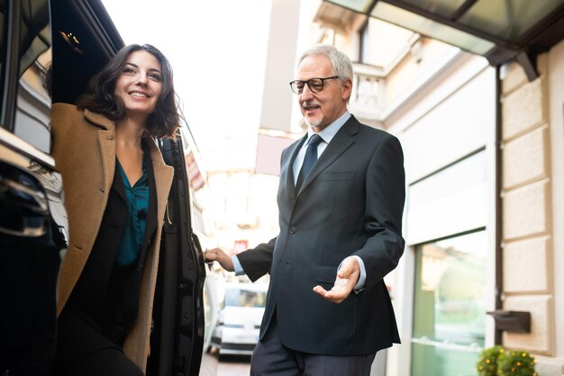 Premium Photo | People using a shuttle transfer service Premium Photo | People using a shuttle transfer service