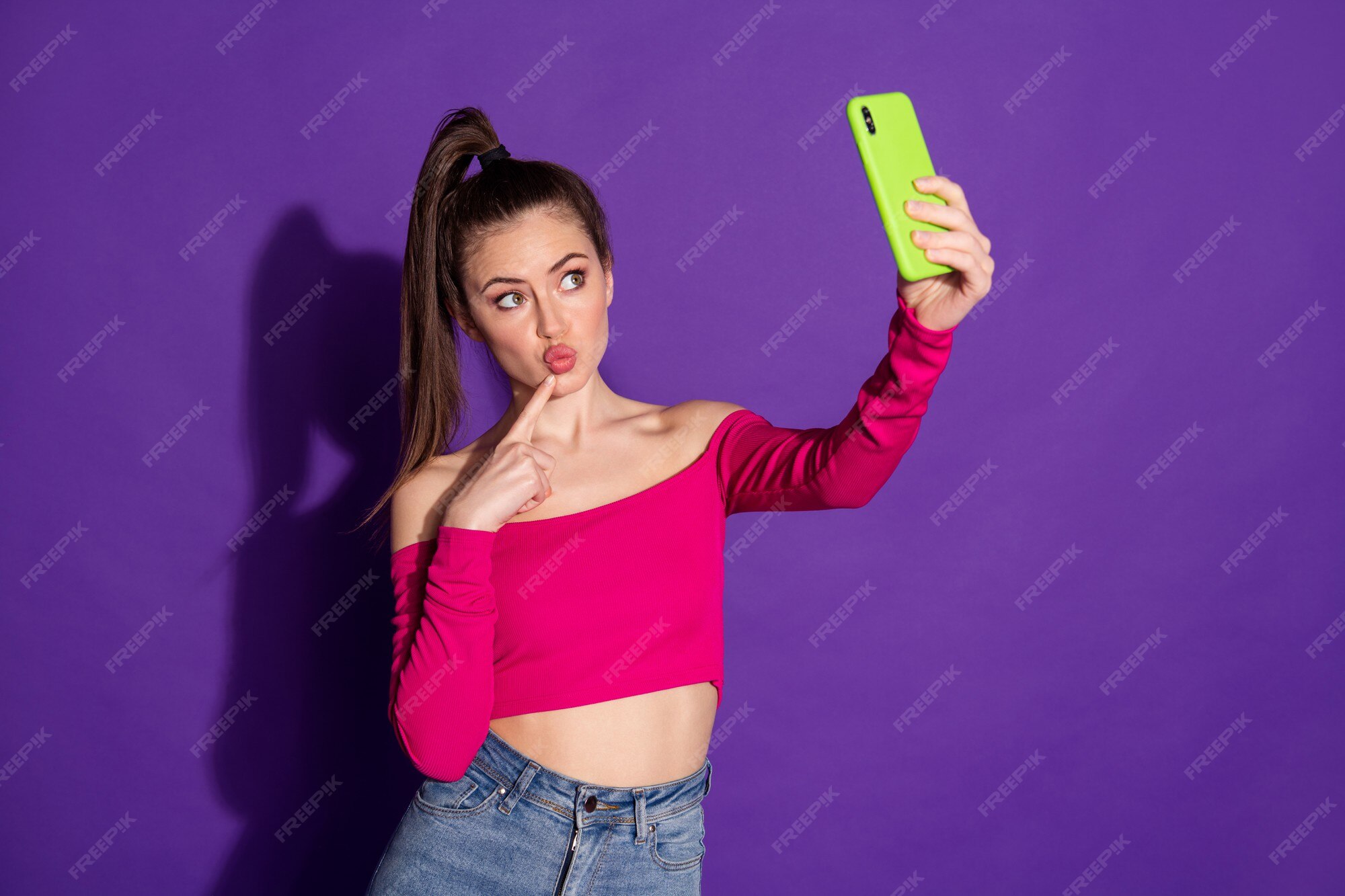 Premium Photo Photo Of Blogger Girl Hold Cellphone Make Selfie Finger Face Wear Pink Top