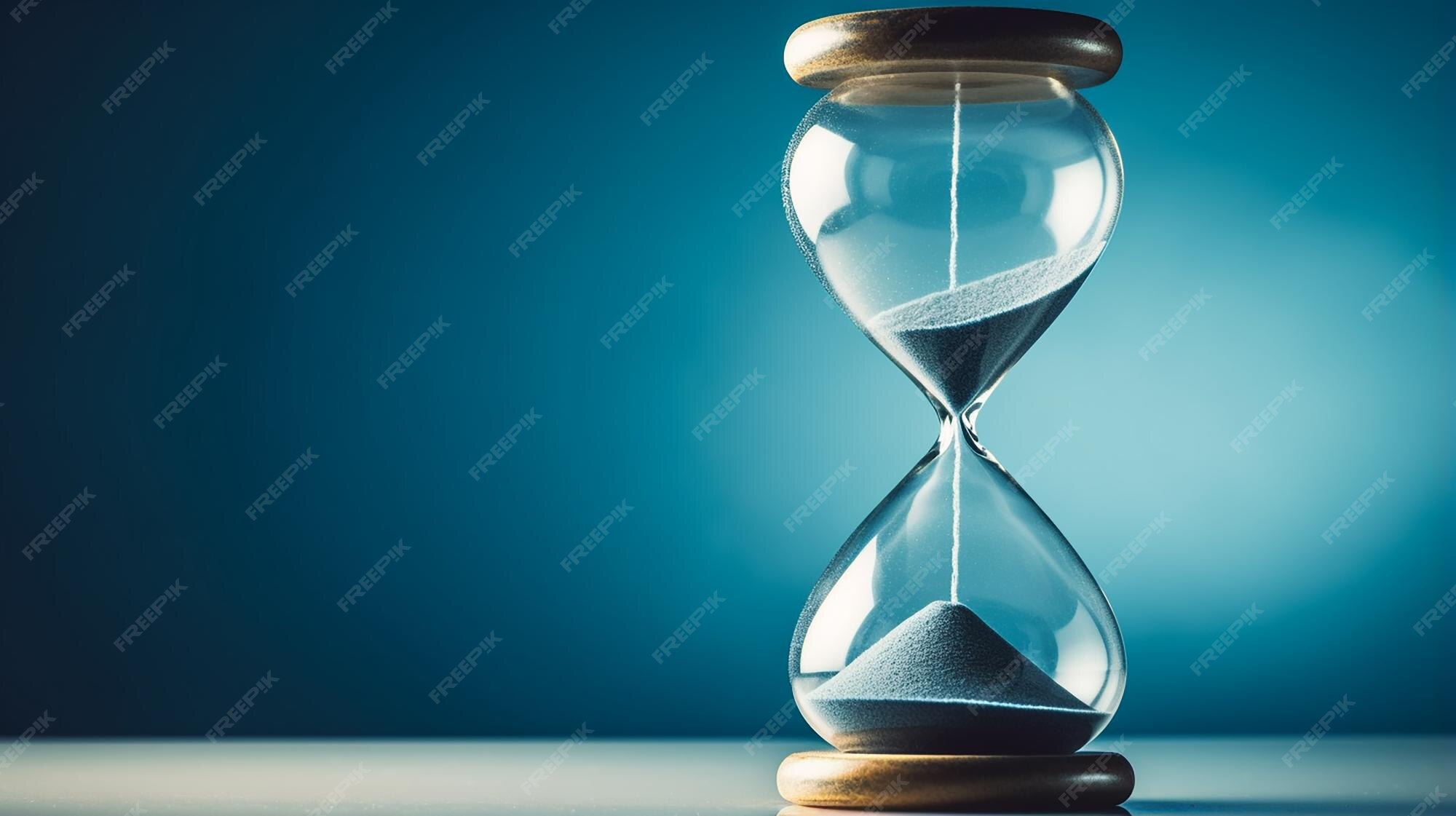 Premium Ai Image Photo Of Hourglass Sand Timer Background And Sand Timer On The Table