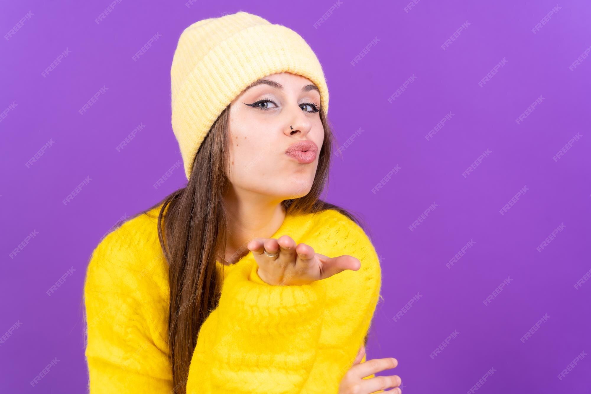 Premium Photo Photo Portrait Of A Young Woman Blowing A Kiss Isolated