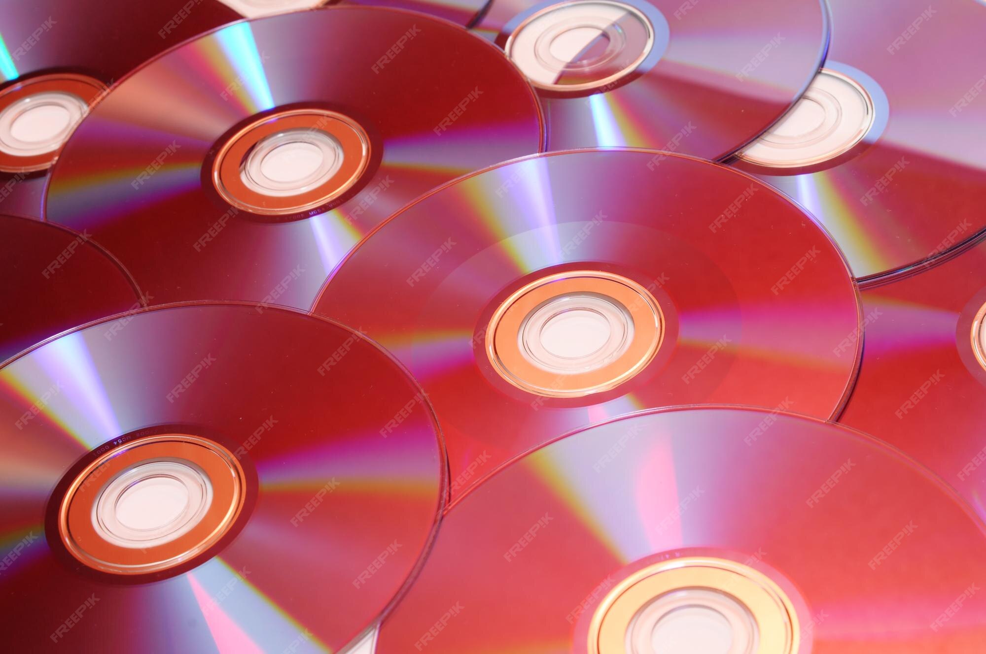 Premium Photo | A pile of cds with one that says'cd'on it Premium Photo | A pile of cds with one that says'cd'on it
