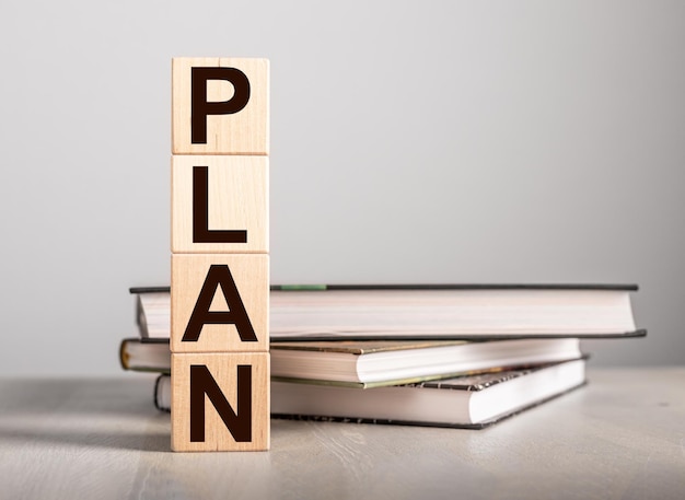 Premium Photo | Plan word text on wooden cube blocks and background Premium Photo | Plan word text on wooden cube blocks and background