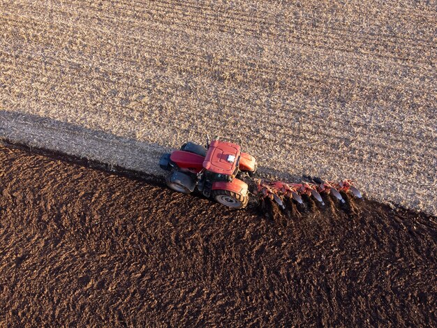 Premium Photo Plowing Field In Early Spring With Tractor Concept Of