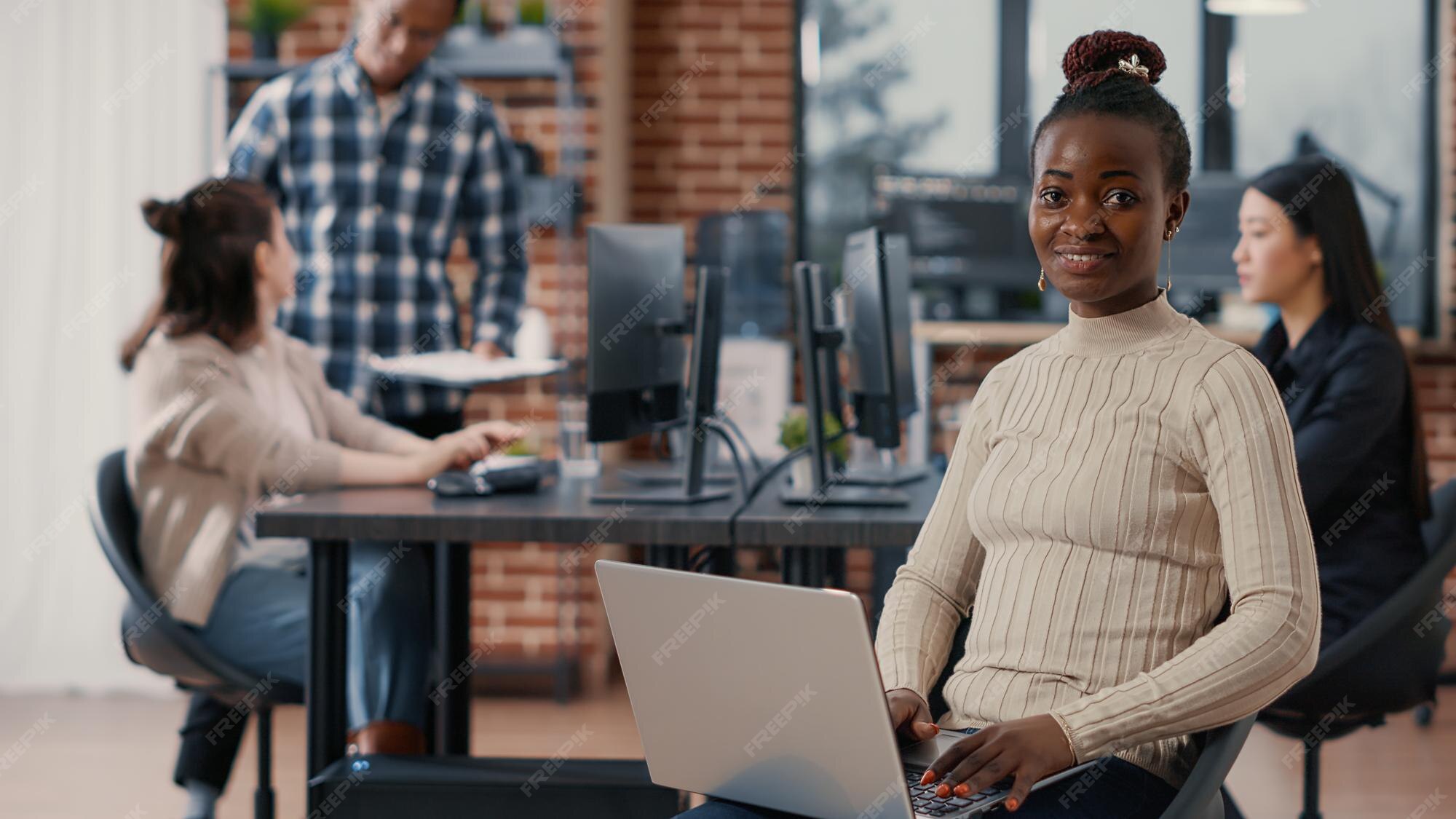Premium Photo | Portrait of african american coder sitting down writing ...