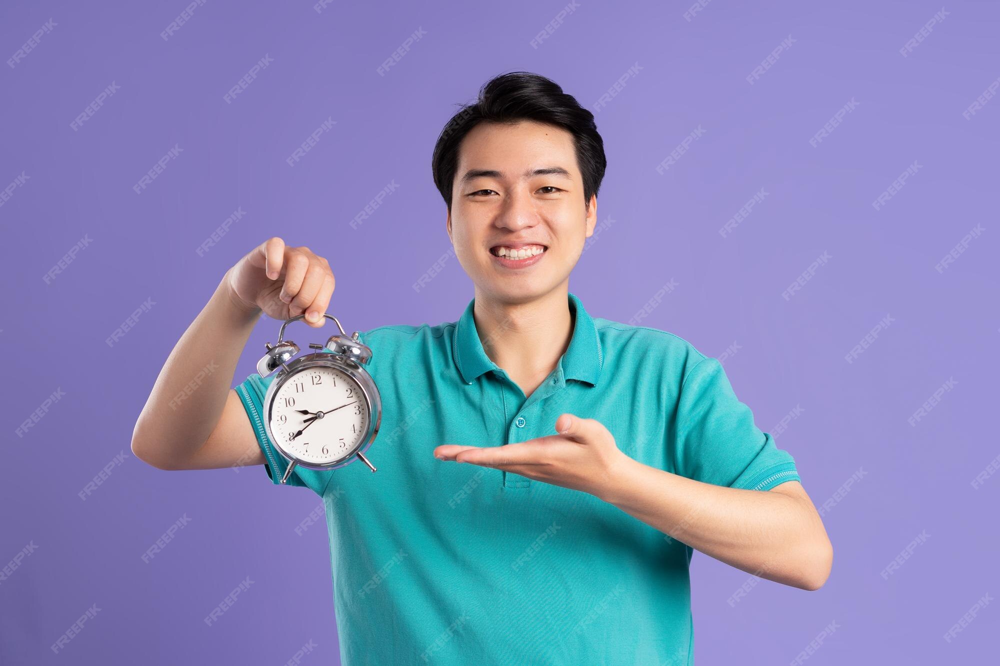 Premium Photo Portrait Of Asian Man Posing On Purple Background