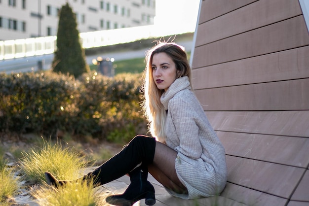 Premium Photo | Portrait of beautiful blonde girl resting on the ground ... Premium Photo | Portrait of beautiful blonde girl resting on the ground ...