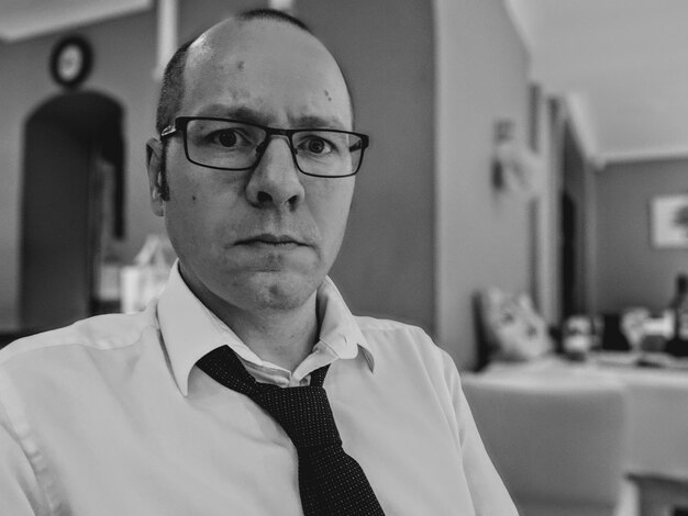 Premium Photo Portrait Of Businessman Wearing Eyeglasses While