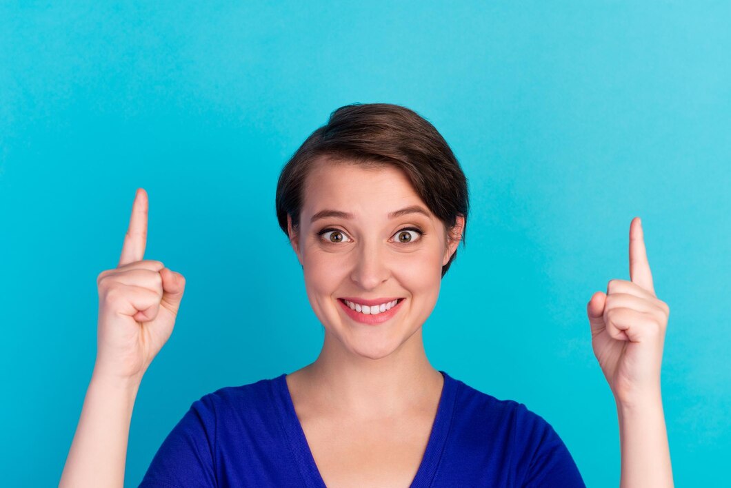 Premium Photo Portrait Of Cheerful Girl Point Index Finger Copyspace