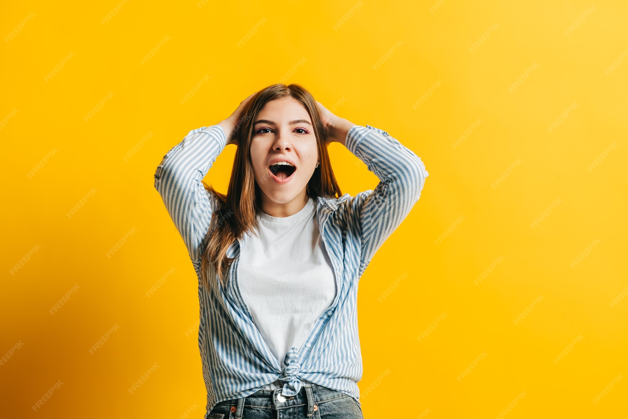 Premium Photo Portrait Of Excited Young Woman Surprised By Something