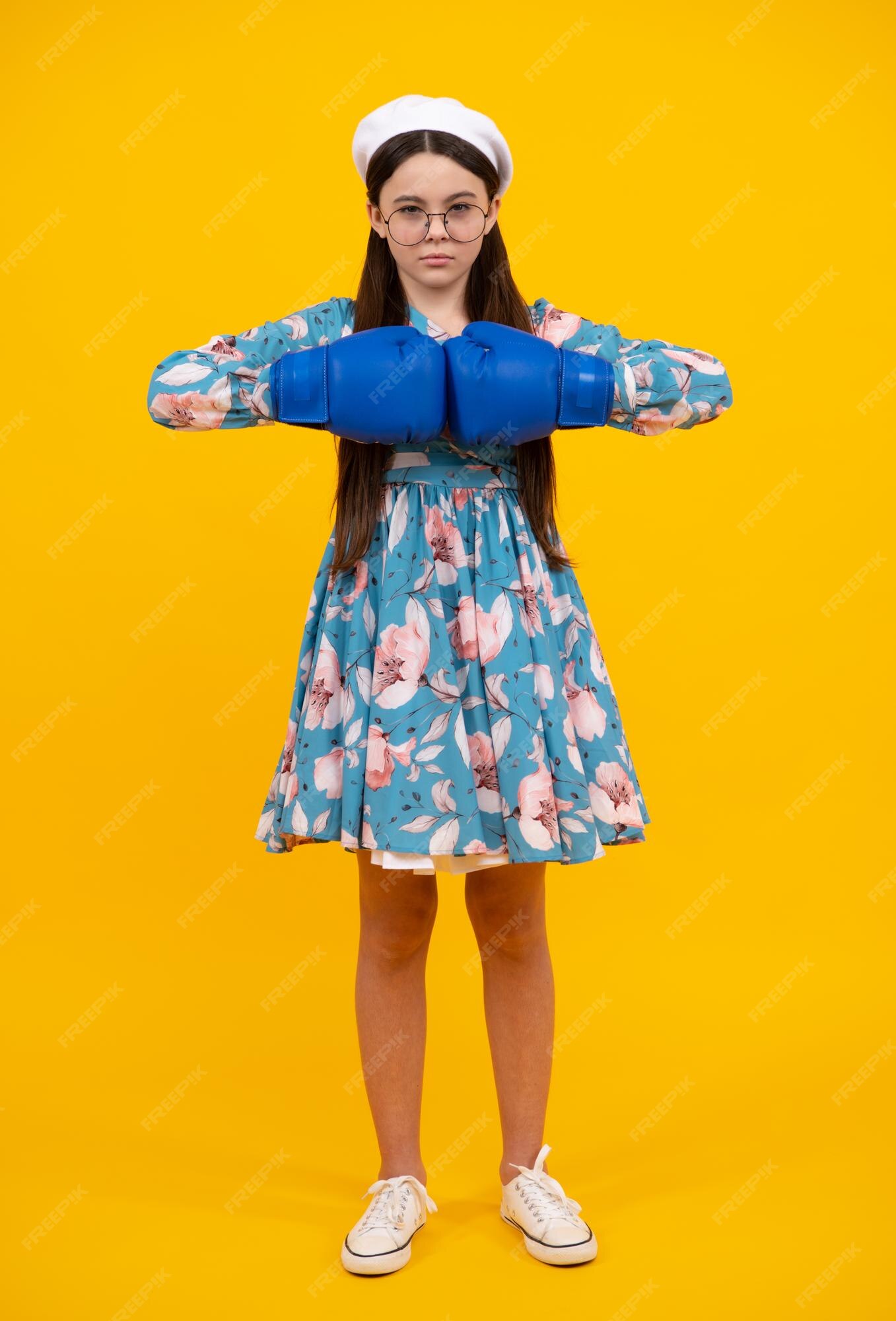 Premium Photo Portrait Of Funny Surprised Winner Teenage Girl In Boxing Gloves Isolated On