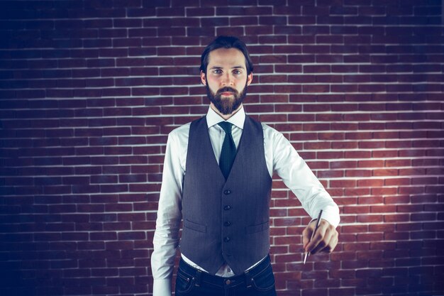 Premium Photo | Portrait of man holding pen Premium Photo | Portrait of man holding pen