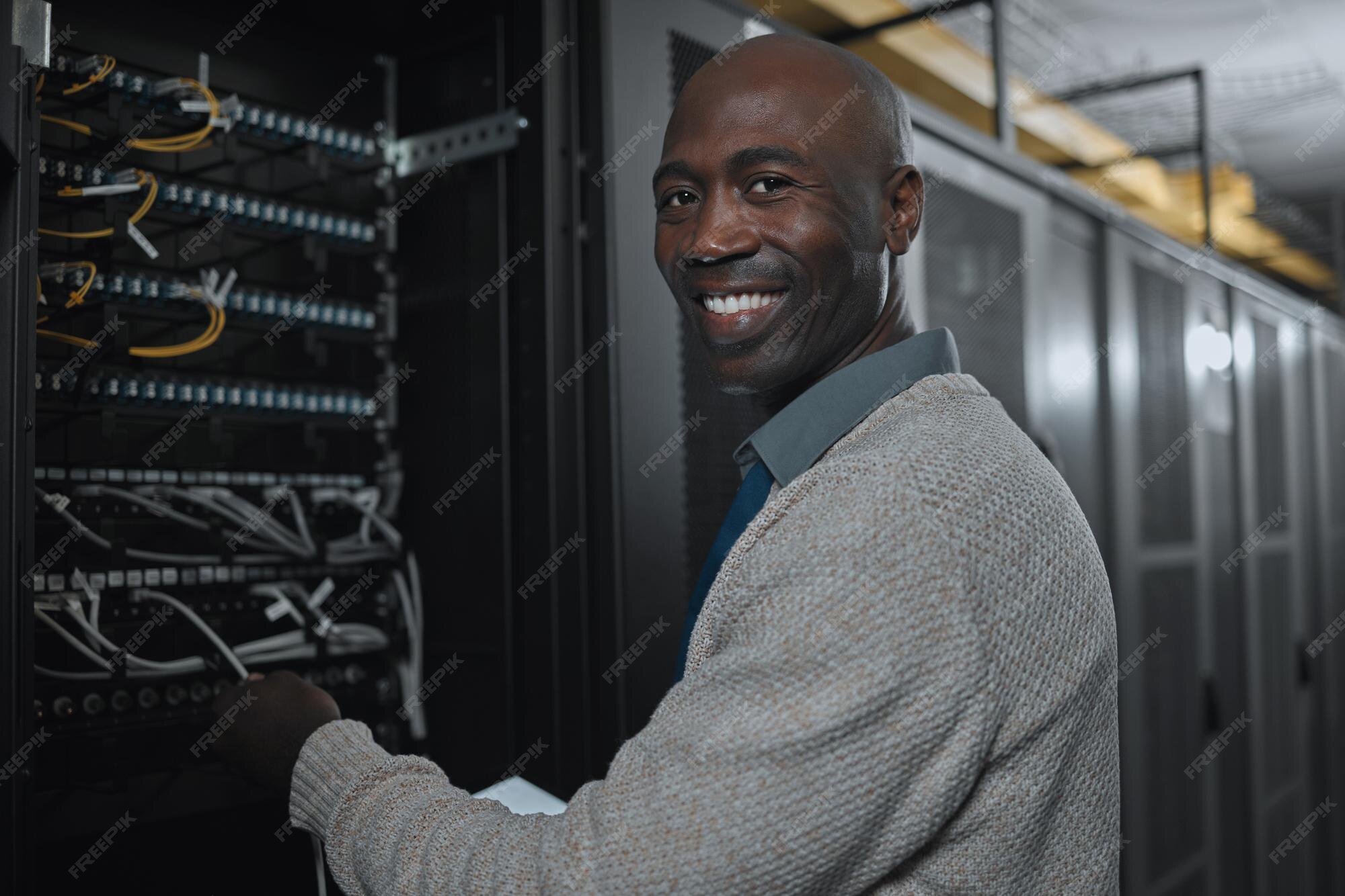 Premium Photo | Portrait server room and black man on tablet for database maintenance or ...