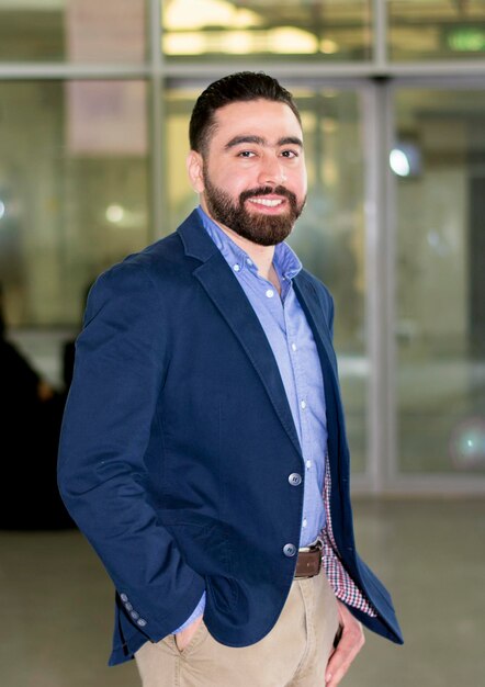 Premium Photo | Portrait of smiling businessman standing outdoors Premium Photo | Portrait of smiling businessman standing outdoors