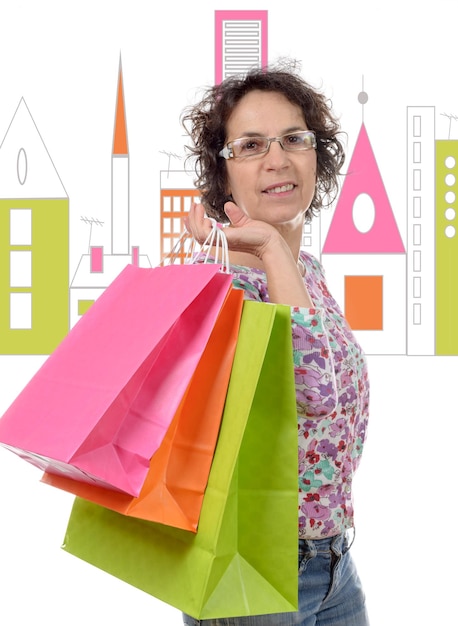 Premium Photo | Portrait of smiling woman holding shopping bags Premium Photo | Portrait of smiling woman holding shopping bags