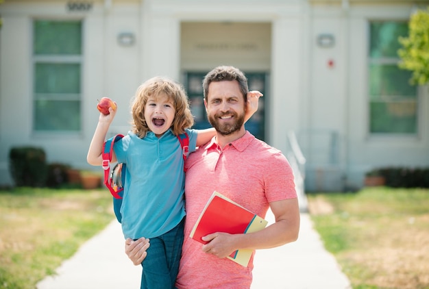 Premium Photo | Portrait of teacher and happy pupil father supports and ... Premium Photo | Portrait of teacher and happy pupil father supports and ...